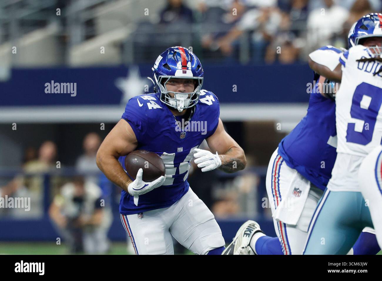 New York Giants running back Cam Skattebo (44) carries the ball during ...