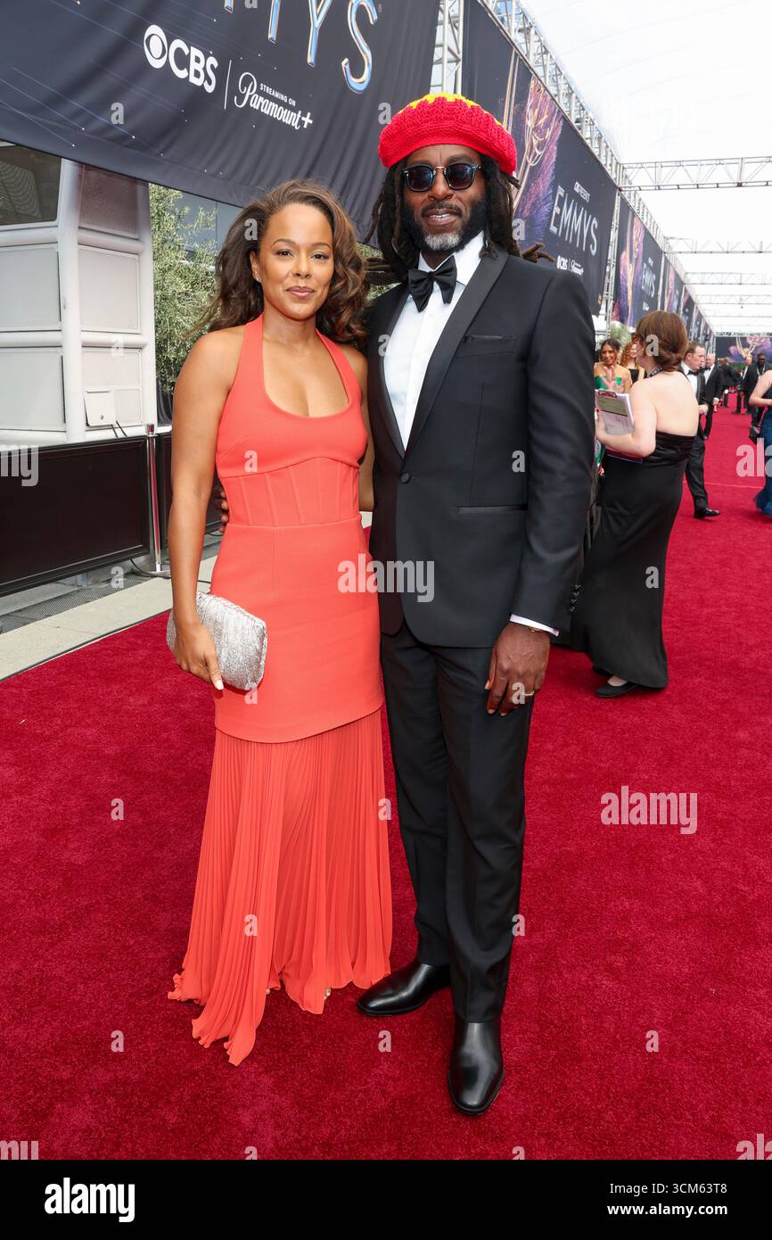 Alexa Marcano, left, and Damian Marcano walk the red carpet at the 77th ...