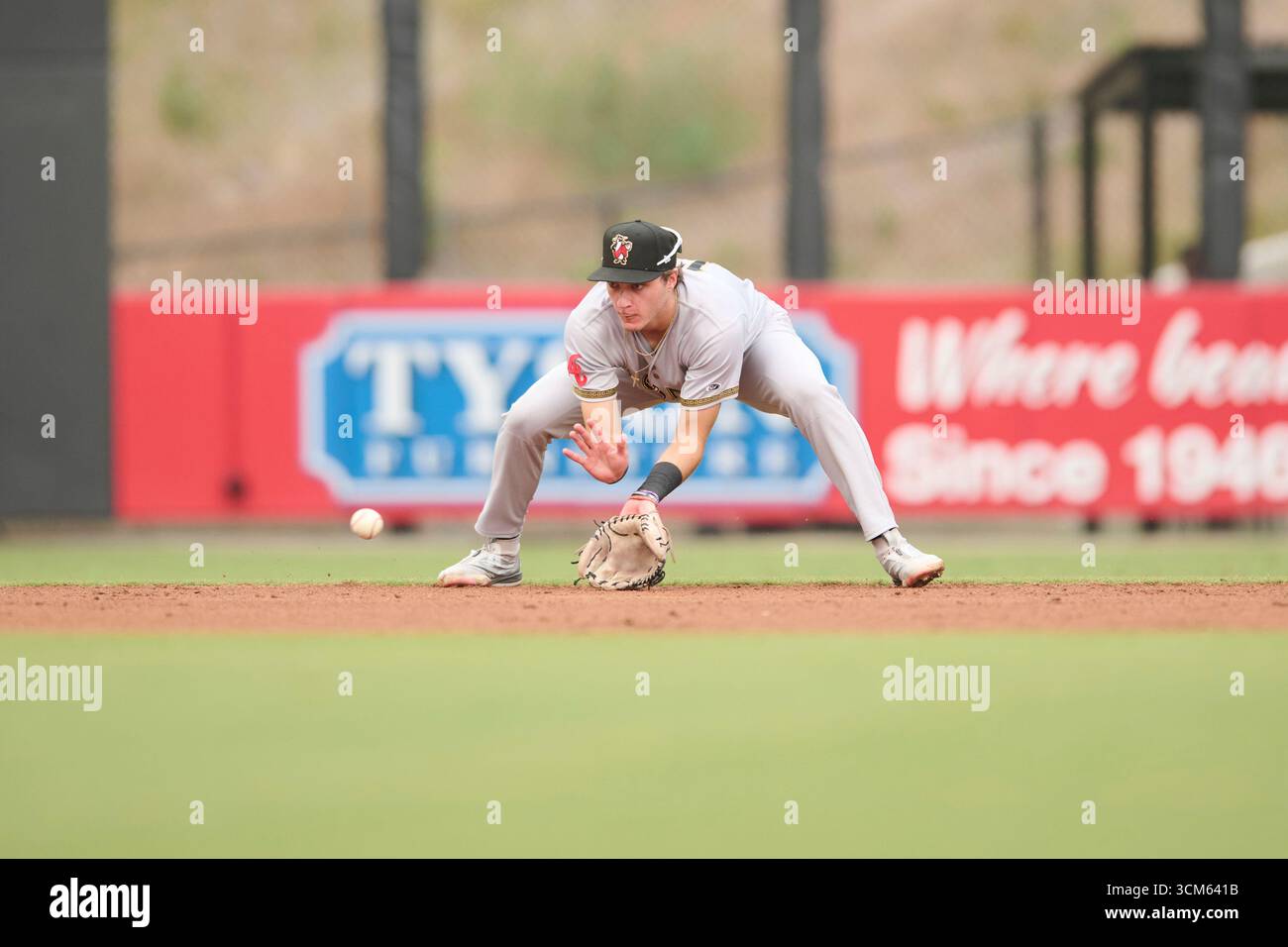 Rome Emperors shortstop Alex Lodise (19) fields a ball during a game against the Asheville ...