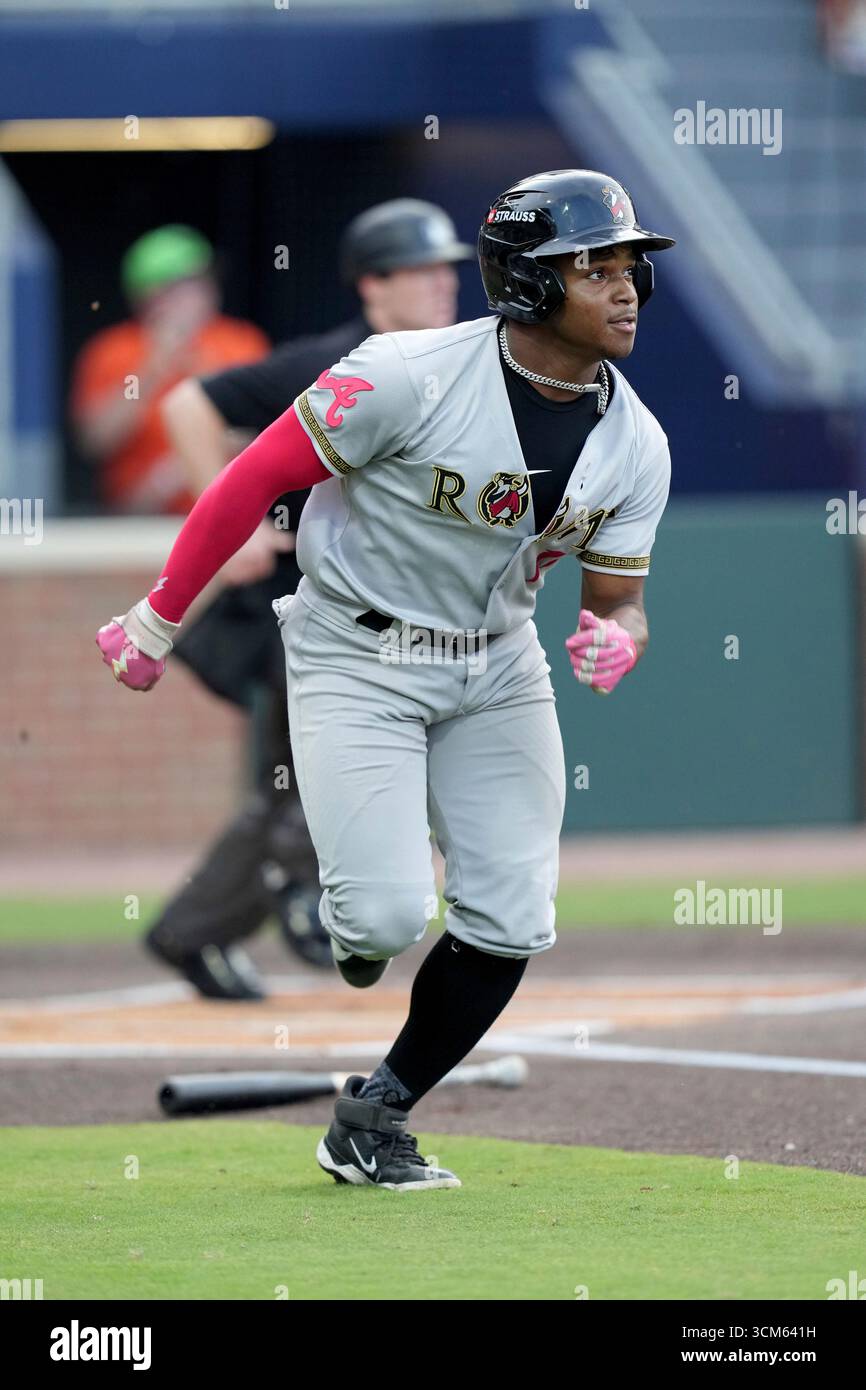 Isaiah Drake (14) of the Rome Emperors runs toward first base in a ...
