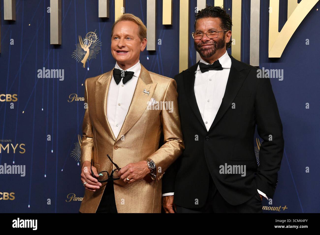 Carson Kressley and John Guerrera arrive at the 77th Primetime Emmy ...