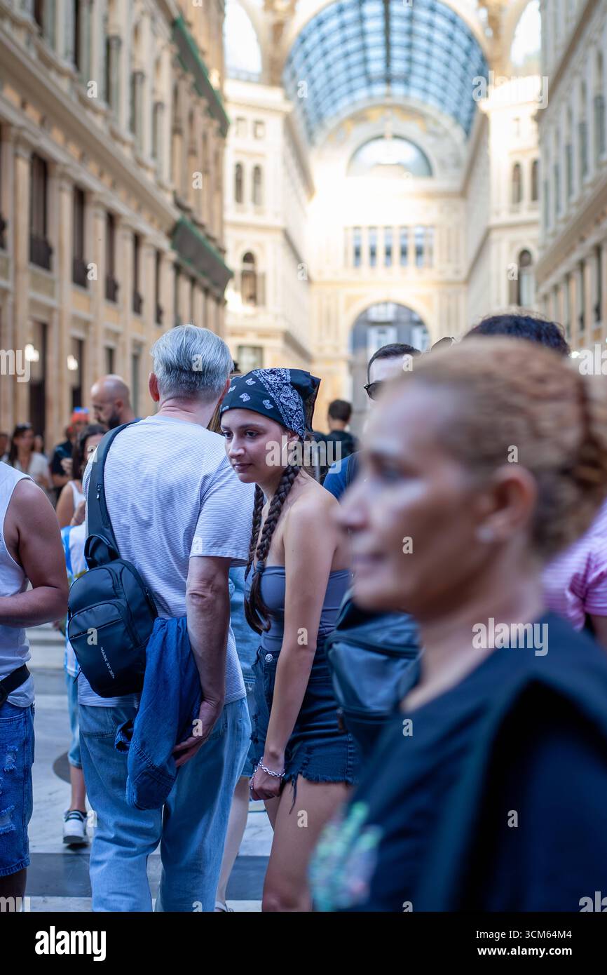 City life in Naples, Italy Naples, Italy - September 12, 2025: People ...