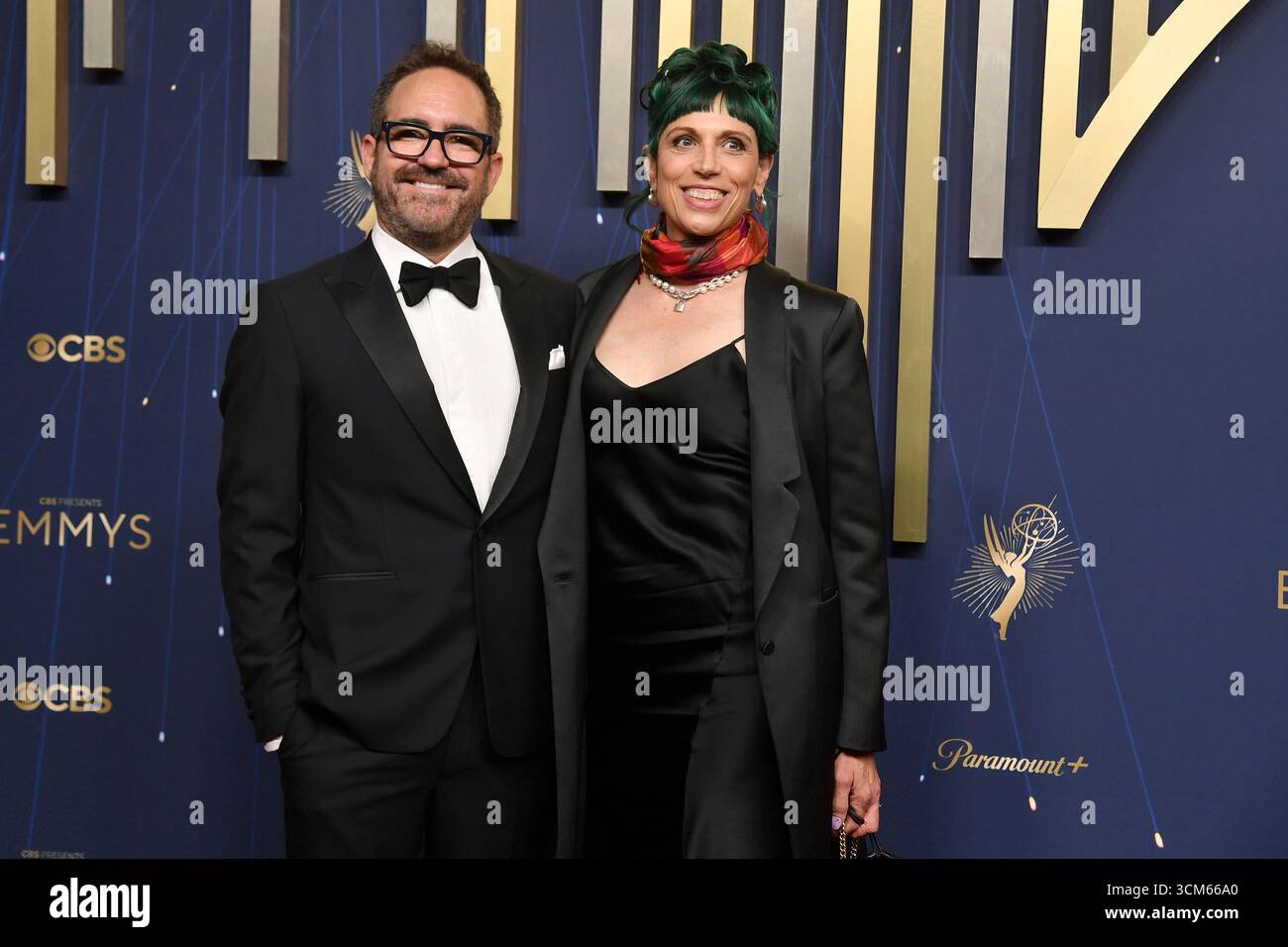 John Hoberg, left and Kat Likkel arrive at the 77th Primetime Emmy ...