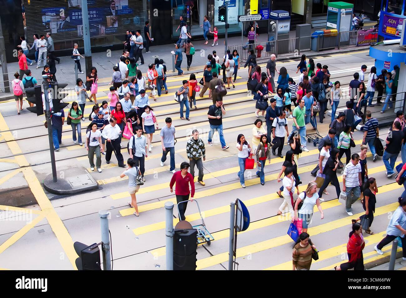 Aerial view of a busy street crossing packed with pedestrians in the ...