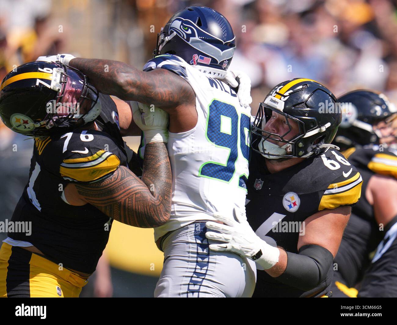 Seattle Seahawks defensive end Leonard Williams (99) is blocked by ...