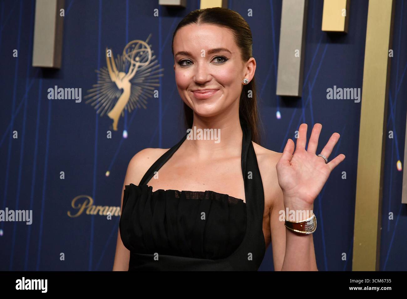 Nicole Brydon Bloom arrives at the 77th Primetime Emmy Awards on Sunday ...