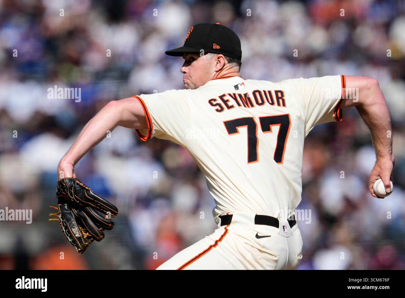 San Francisco Giants pitcher Carson Seymour throws to a Los Angeles ...