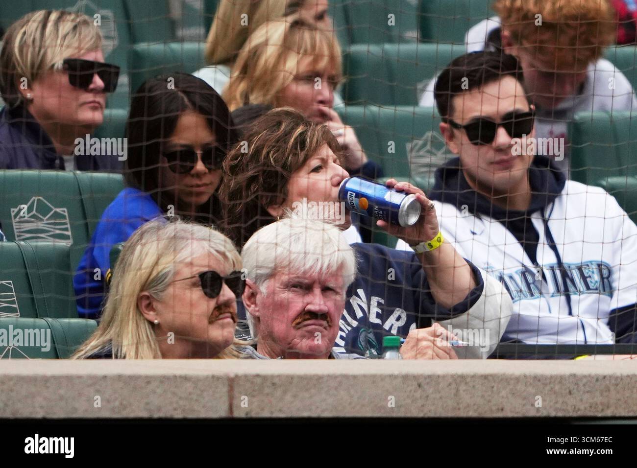 Seattle Mariners majority owner John Stanton wears a fake mustache ...