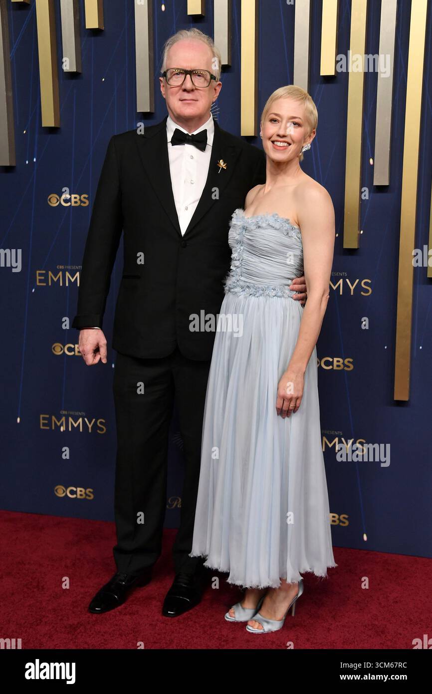 Tracy Letts, left, and Carrie Coon arrive at the 77th Primetime Emmy ...