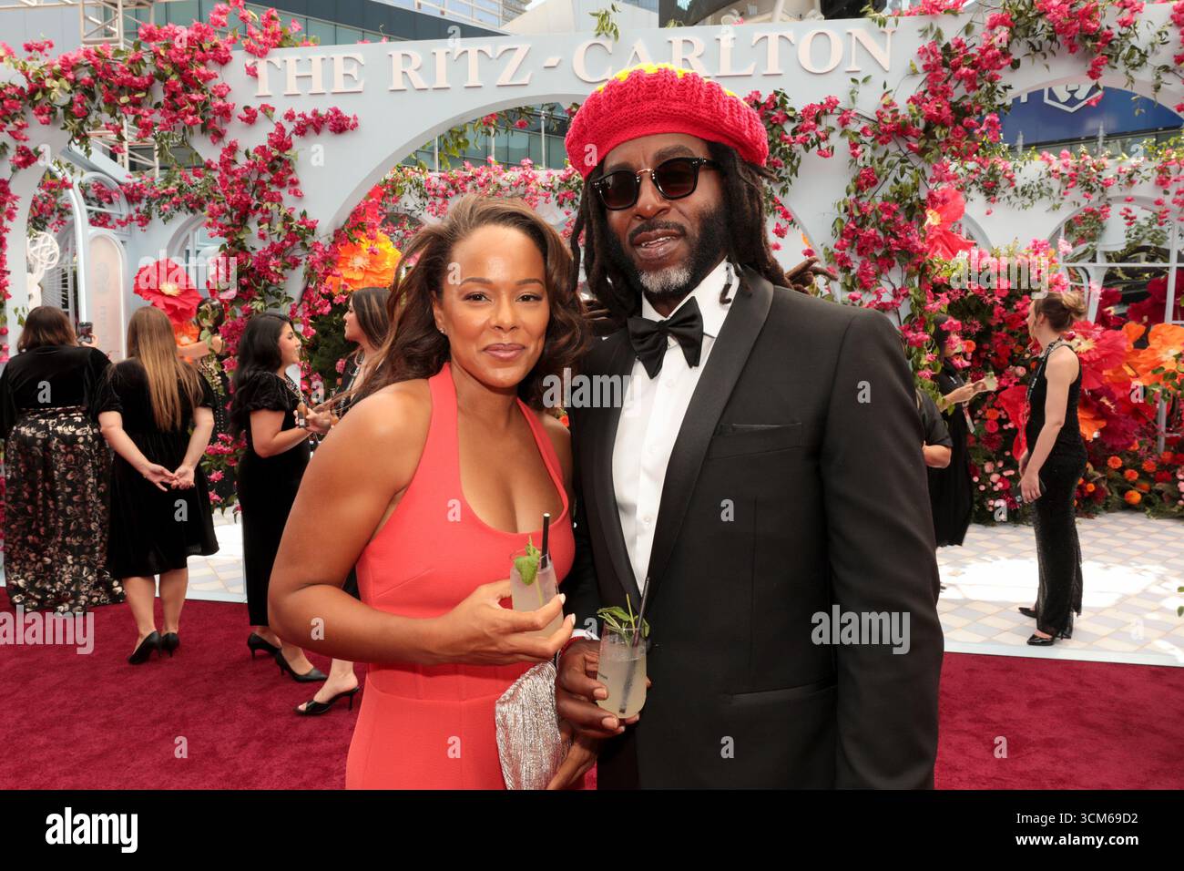 Alexa Marcano, left, and Damian Marcano walk the red carpet at the 77th ...