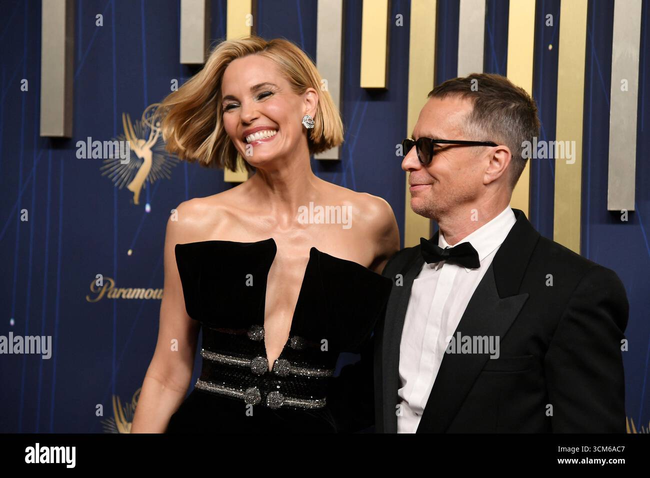 Leslie Bibb, left, and Sam Rockwell arrive at the 77th Primetime Emmy ...