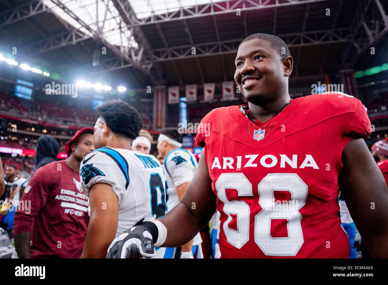 Arizona Cardinals offensive tackle Kelvin Beachum (68) smiles after a ...