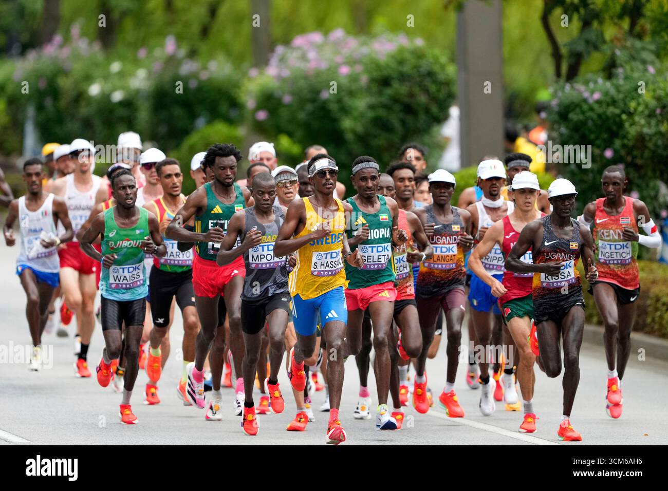 Sweden's Suldan Hassan, center, leads the men's marathon at the World ...