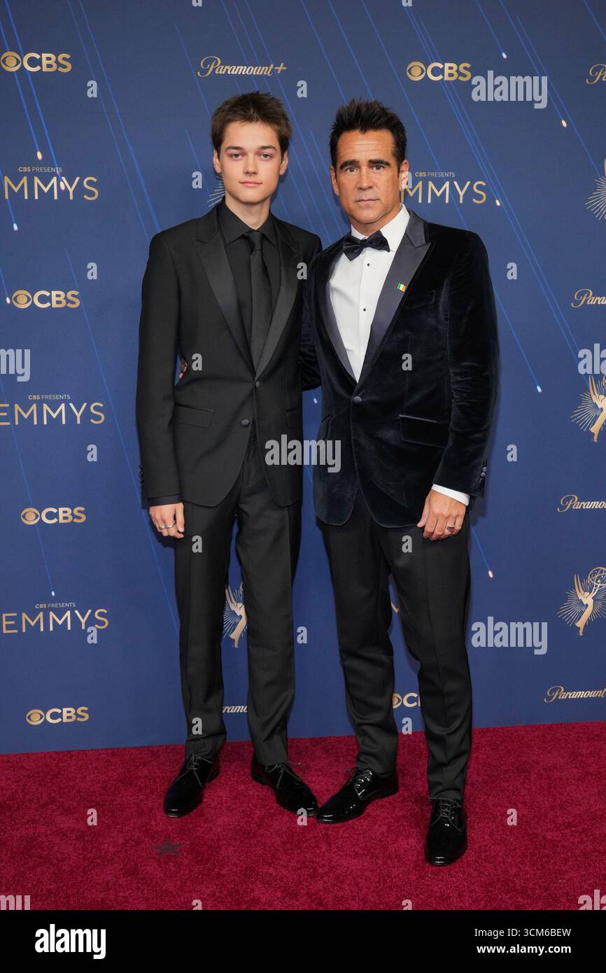 Henry Farrell, left, and Colin Farrell arrive at the 77th Emmy Awards ...