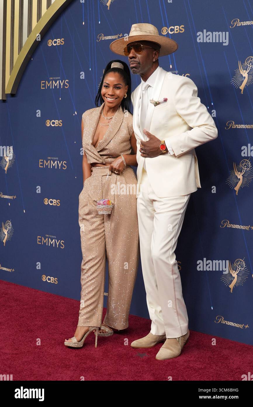Shahidah Omar, left, and J. B. Smoove arrive at the 77th Primetime Emmy ...
