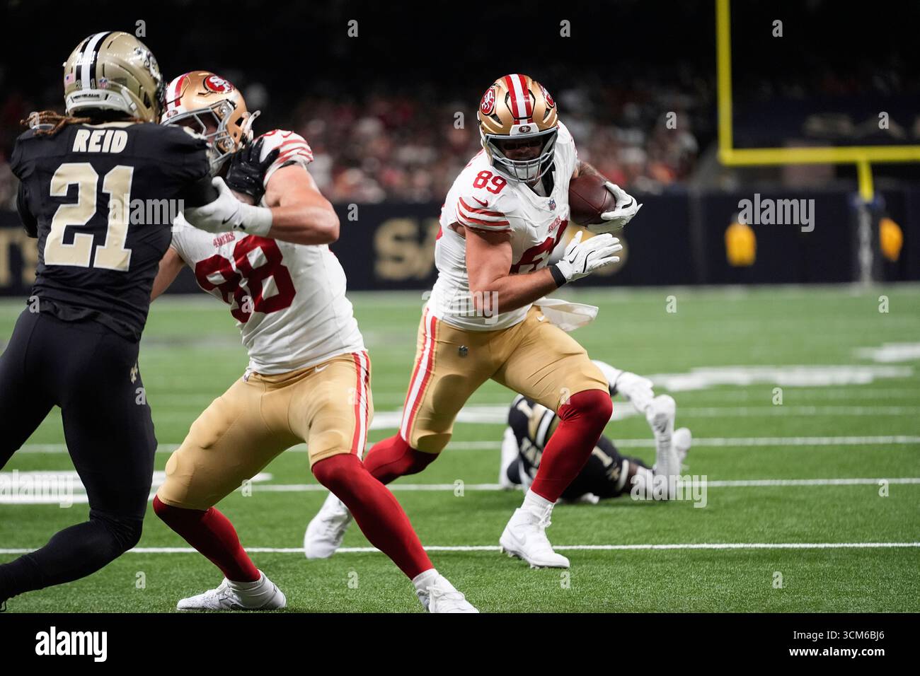 San Francisco 49ers tight end Luke Farrell (89) carries for a touchdown ...
