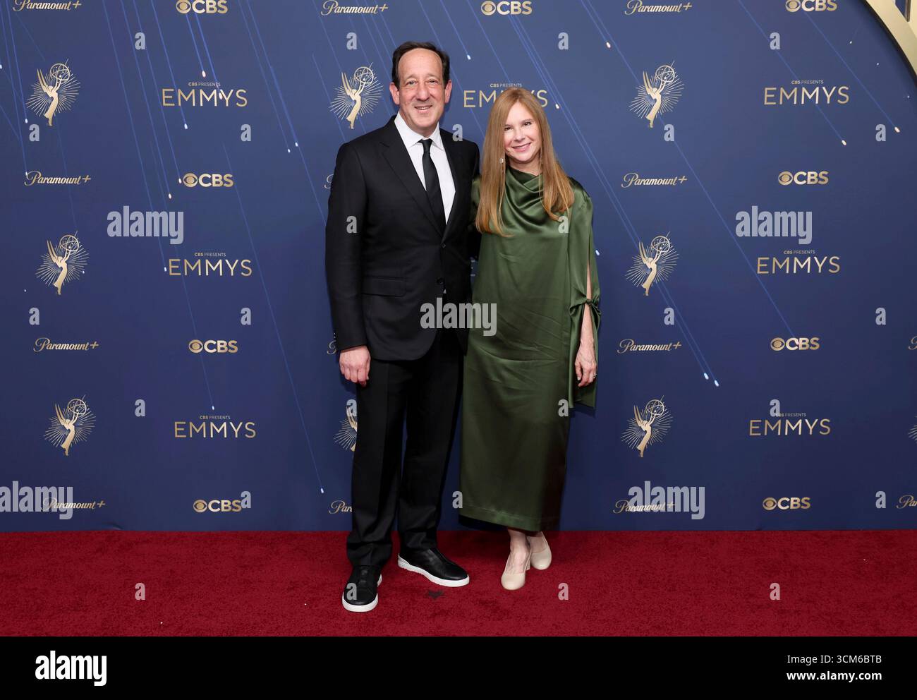 David Miner, left, and Jennifer Miner arrive at the 77th Emmy Awards on ...