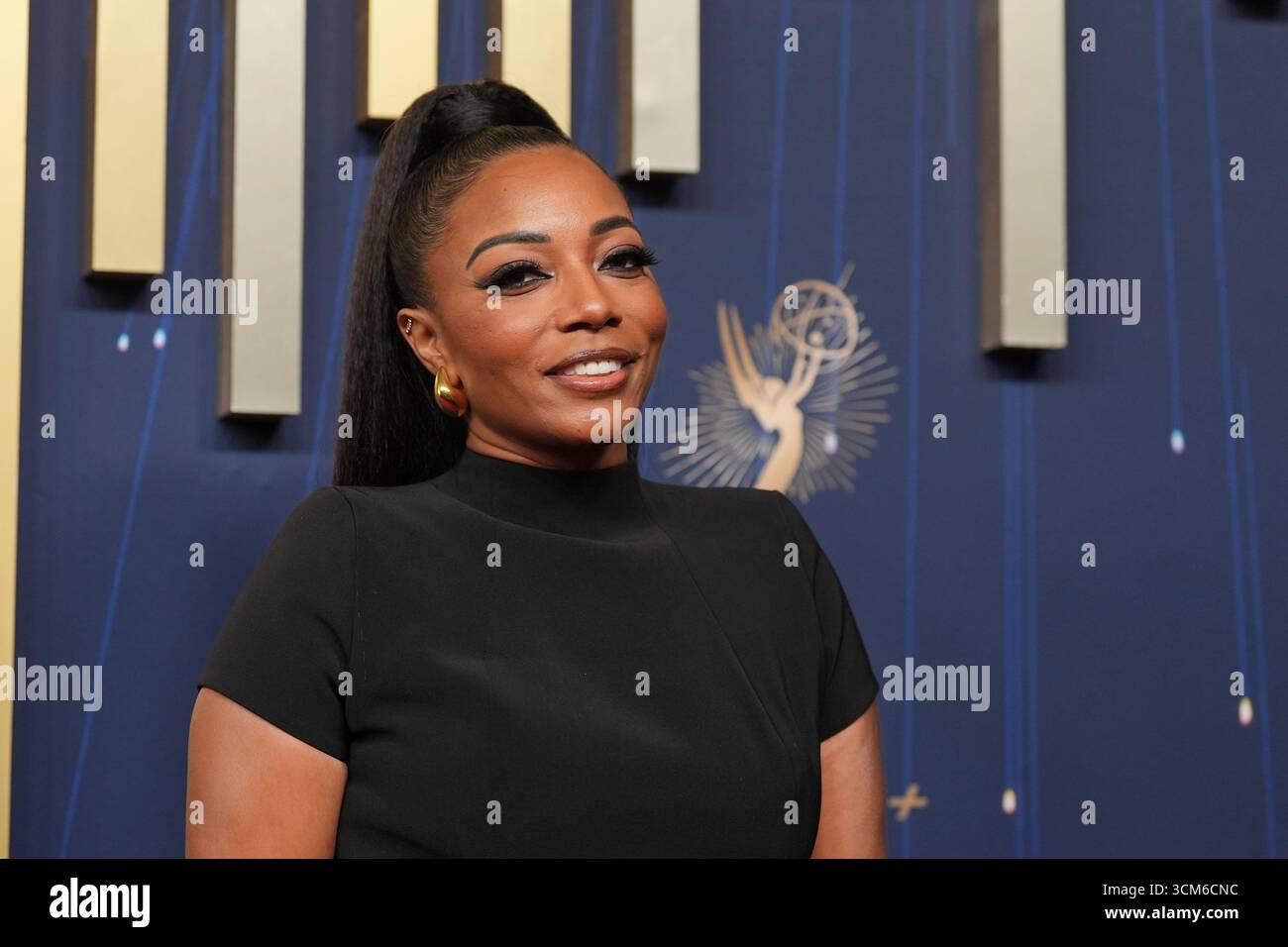 Dionne Harmon arrives at the 77th Primetime Emmy Awards on Sunday, Sept ...