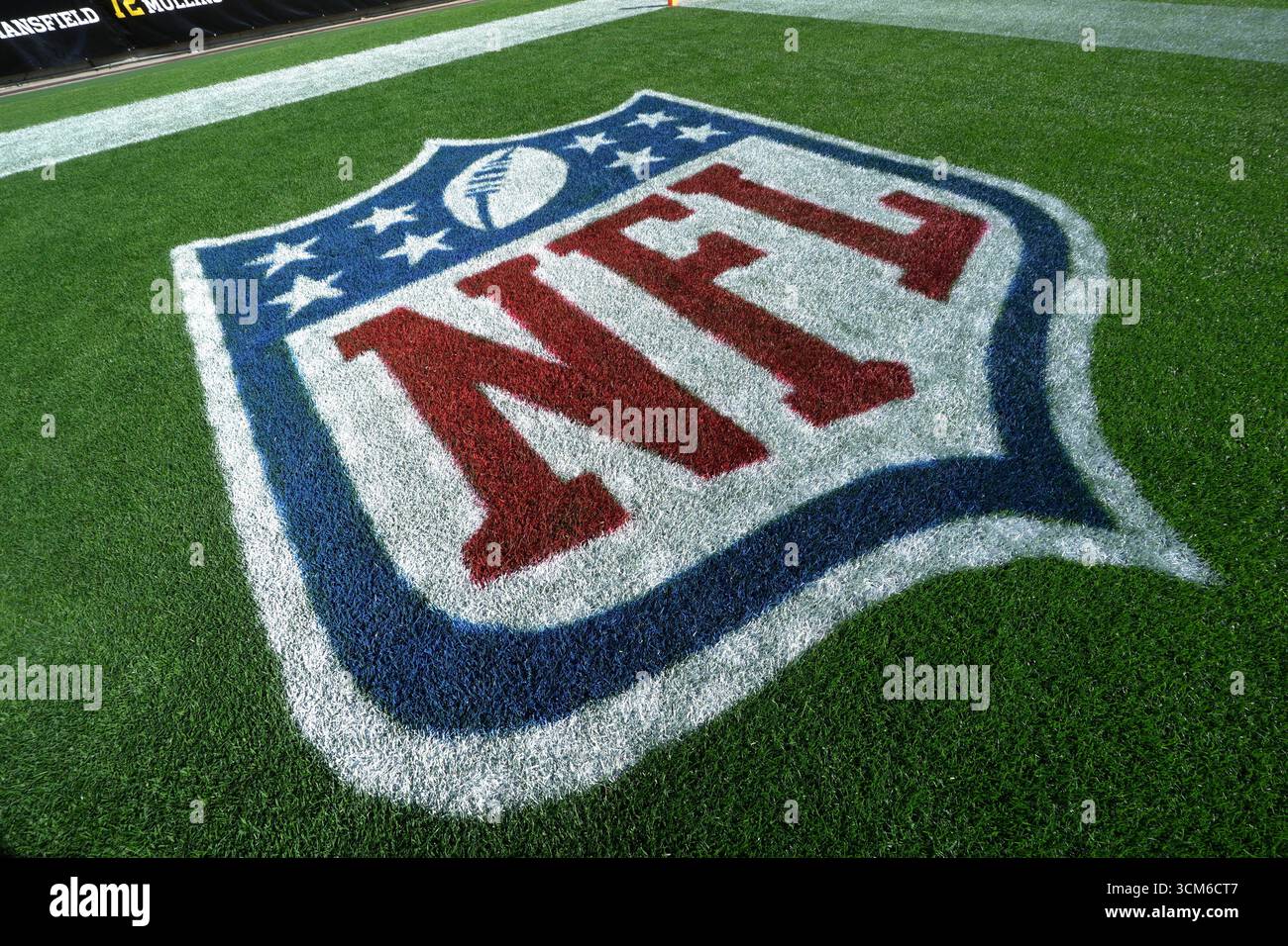 This is the NFL football logo in the end zone at Acrisure Stadium ...