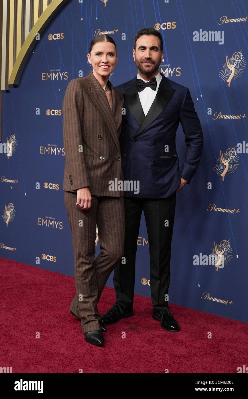 Jessica Radloff, left, and Brett Goldstein arrive at the 77th Primetime ...