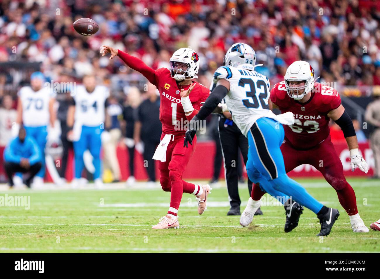 Arizona Cardinals quarterback Kyler Murray (1) throws the ball past ...