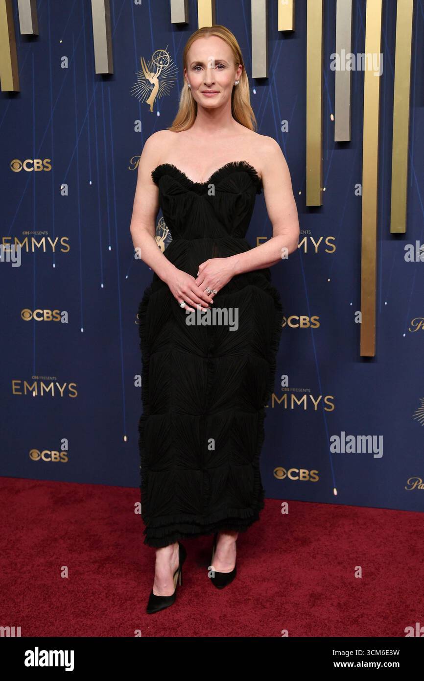 Genevieve O'Reilly arrives at the 77th Primetime Emmy Awards on Sunday ...