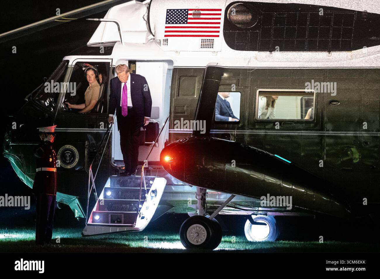 President Donald Trump disembarks from Marine One as he arrives on the ...