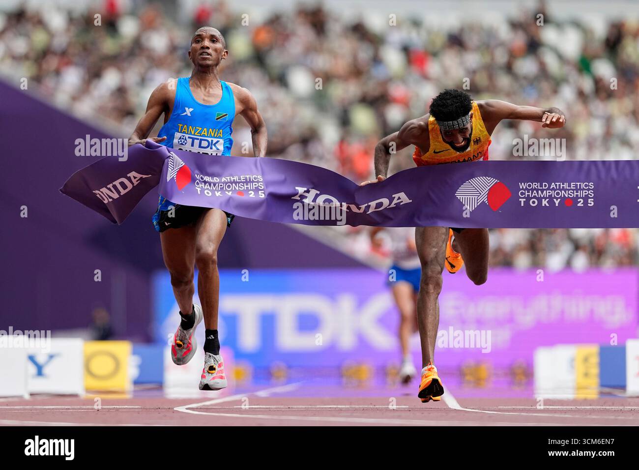 Tanzania's Alphonce Felix Simbu, left, wins the gold in the men's ...