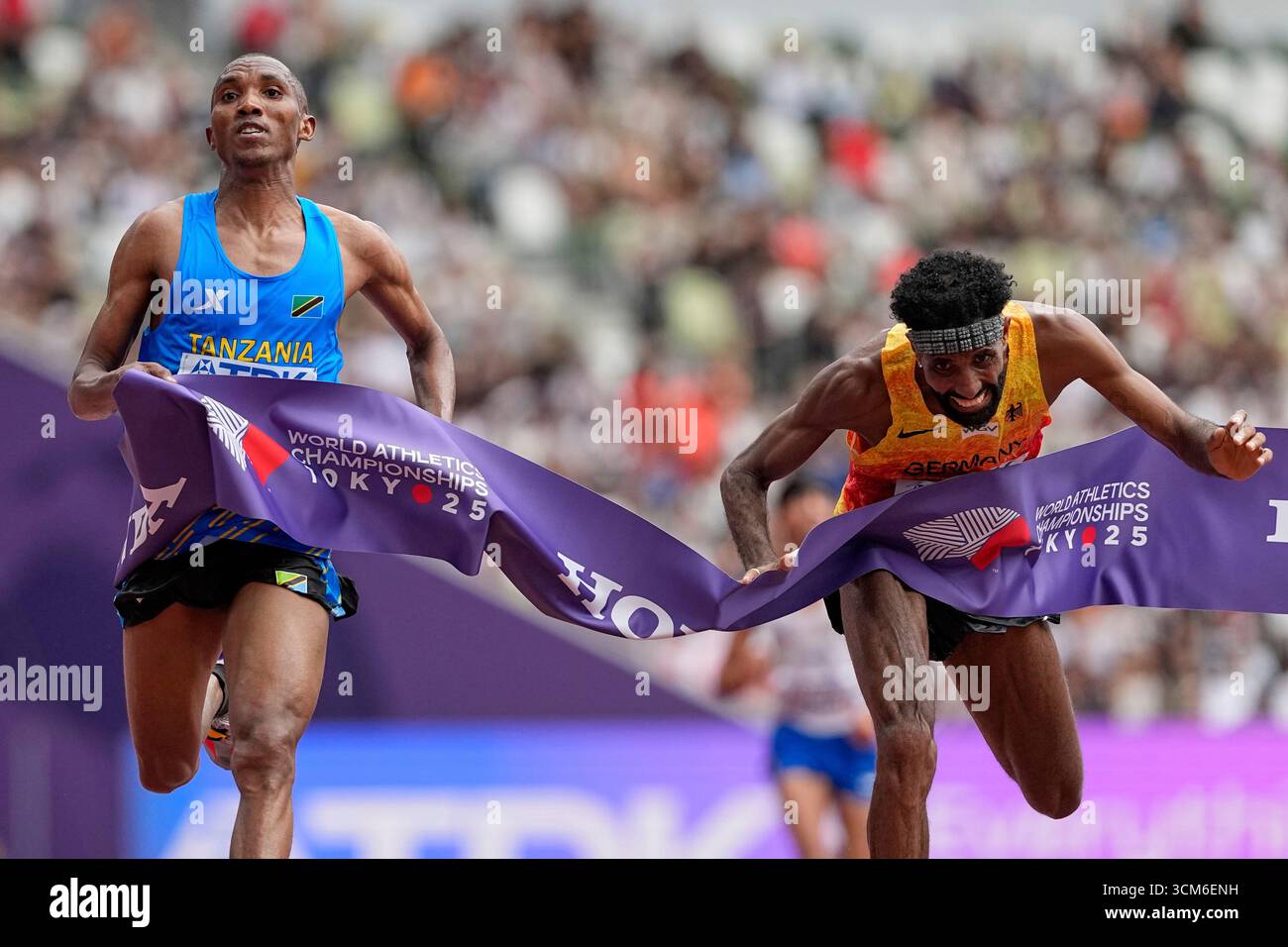 Tanzania's Alphonce Felix Simbu, left, wins the gold in the men's ...