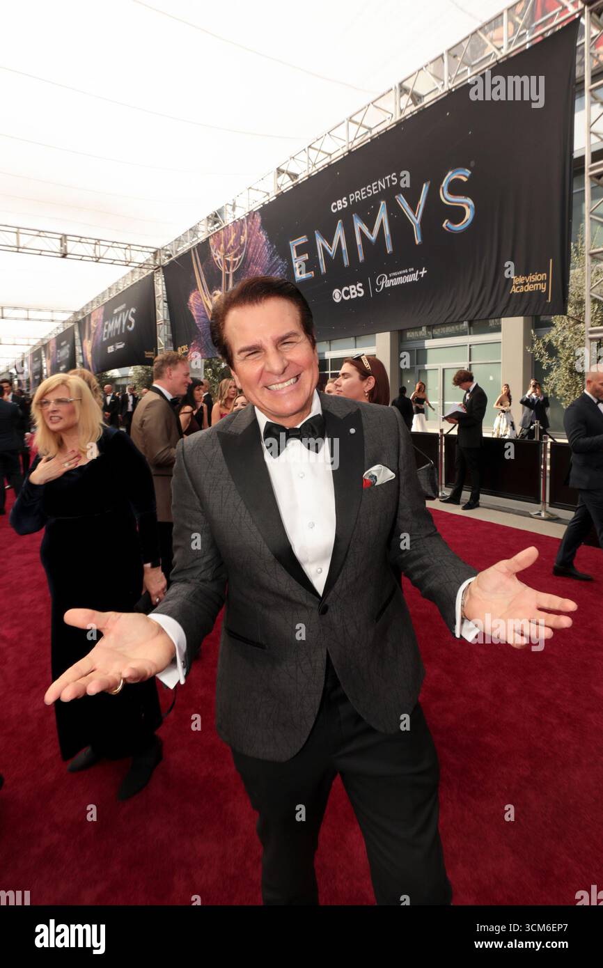 Vincent De Paul walks the red carpet at the 77th Emmy Awards on Sunday ...