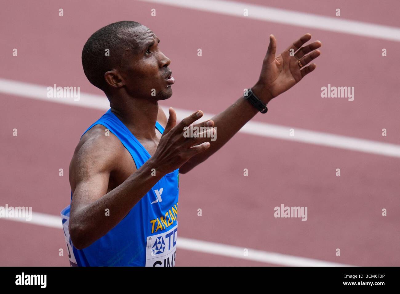 Tanzania's Alphonce Felix Simbu reacts after winning the men's marathon ...