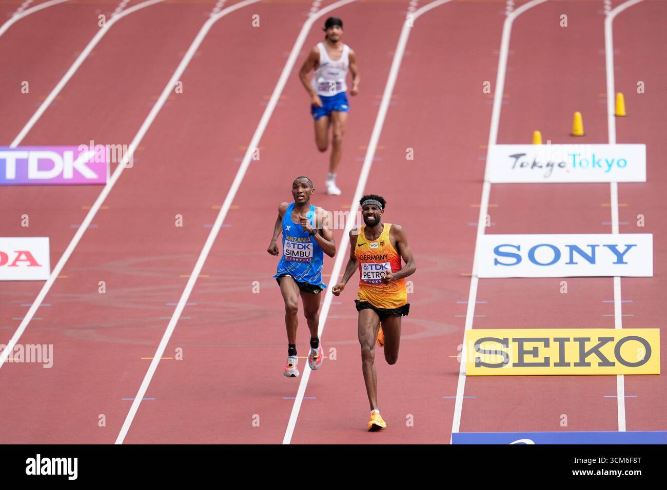 Germany's Amanal Petros, right, and Tanzania's Alphonce Felix Simbu ...