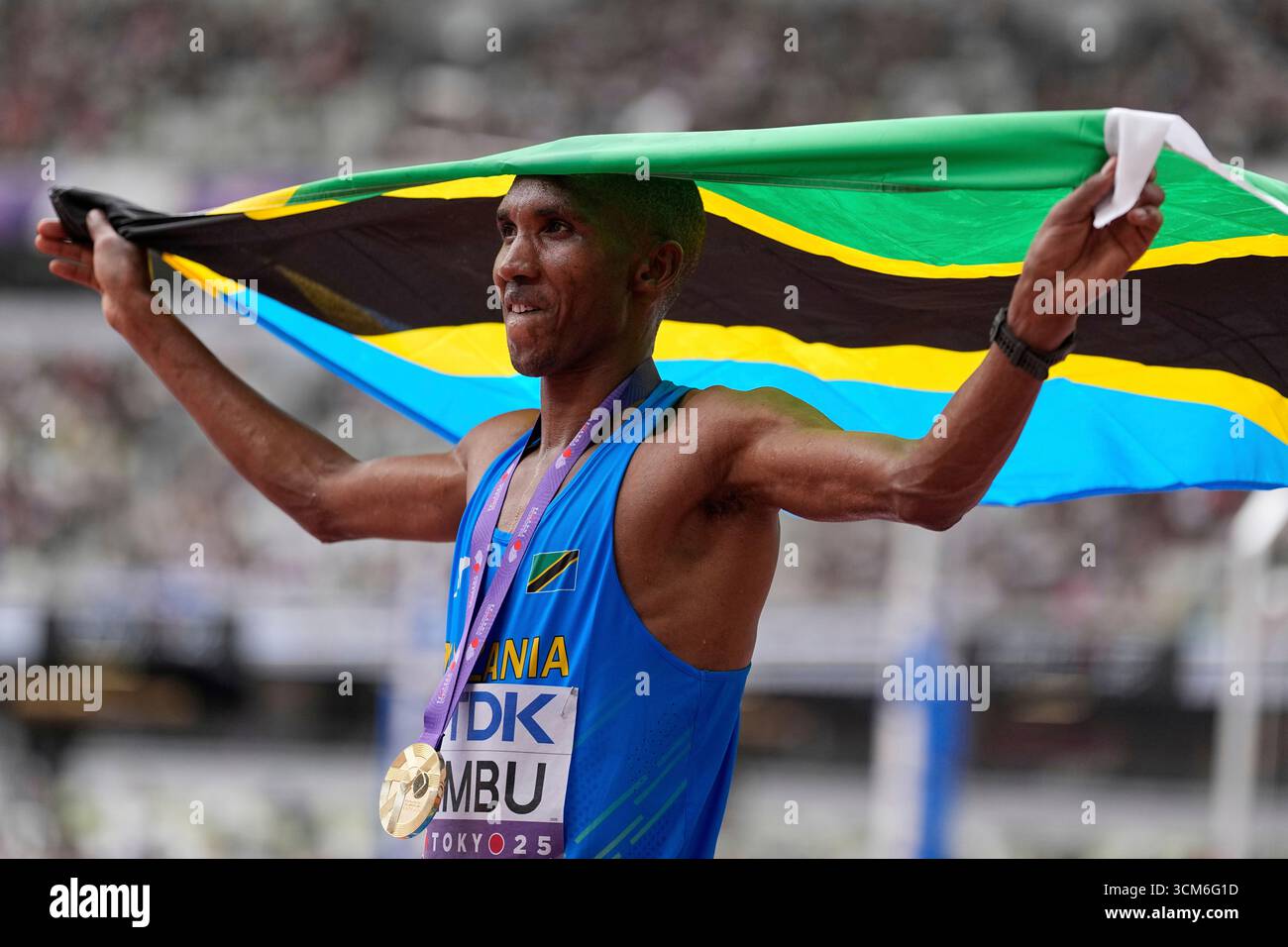 Tanzania's Alphonce Felix Simbu celebrates after winning the gold in ...