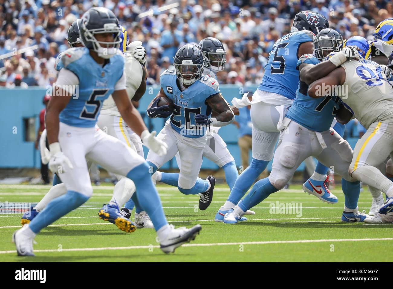 Tennessee Titans running back Tony Pollard (20) runs with the ball ...