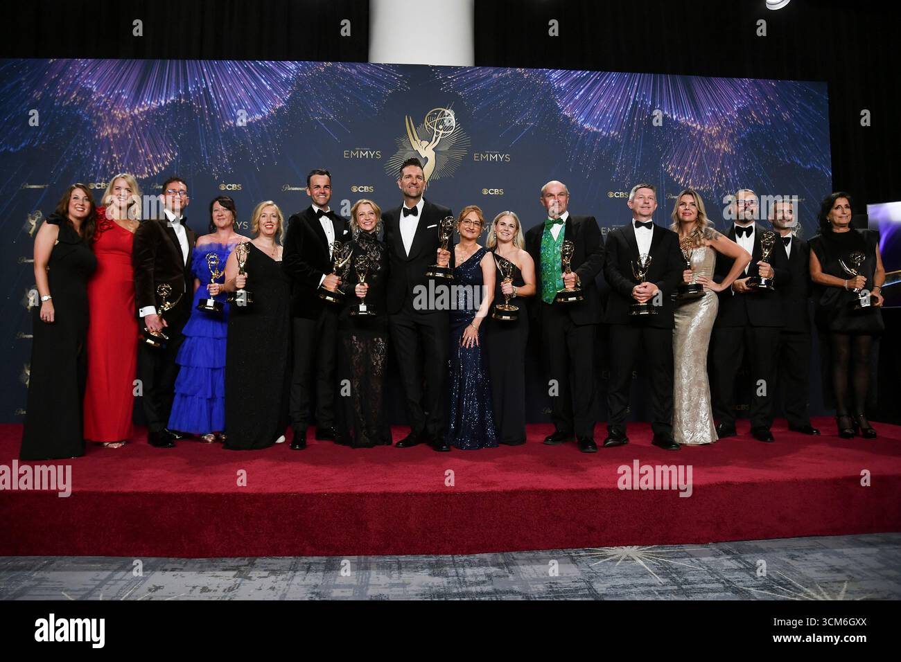 The team from "The Traitors," winners of the award for outstanding ...