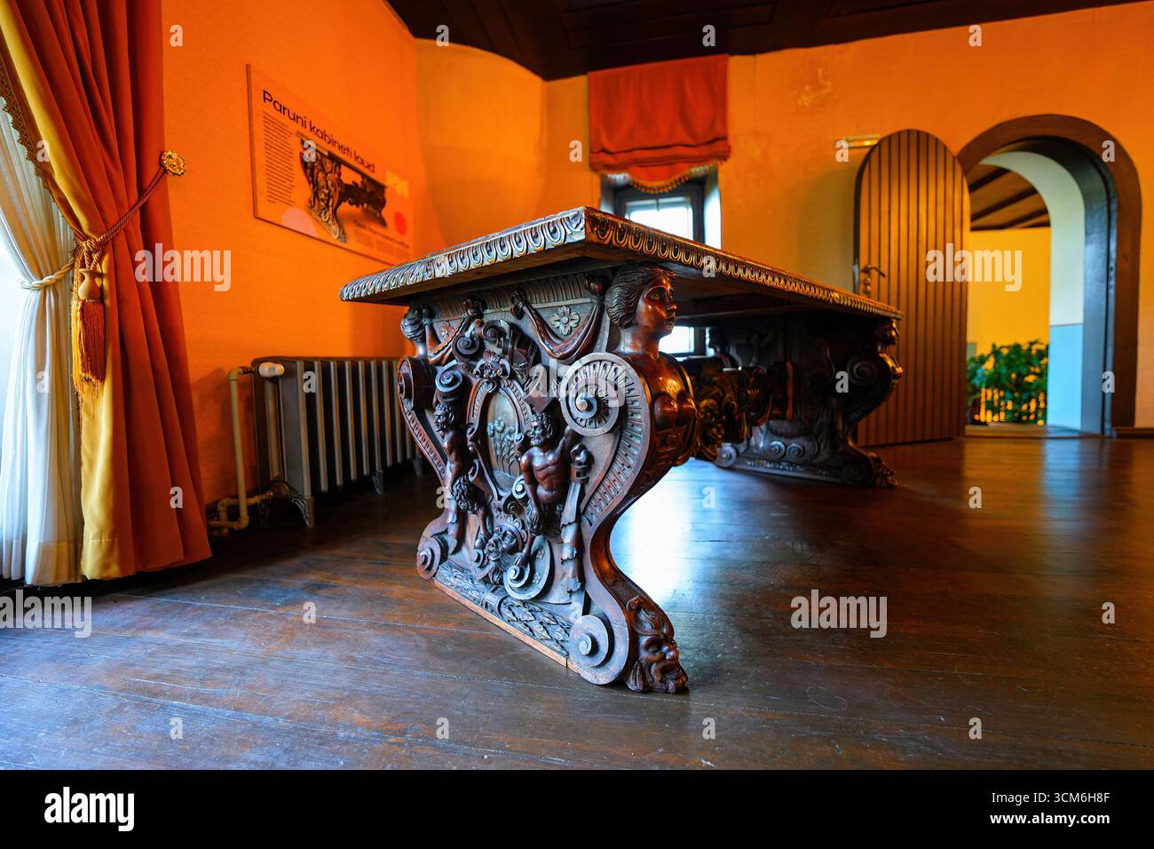 Carved wooden desk in the Alatskivi Castle, a neo-Gothic castle in ...