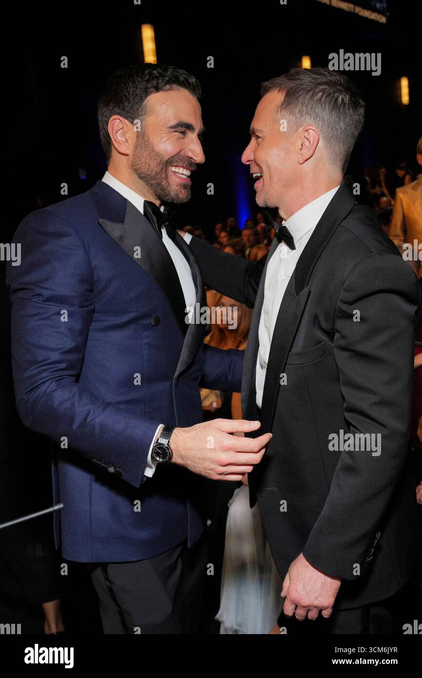 Brett Goldstein, left, and Sam Rockwell attend the 77th Emmy Awards on ...