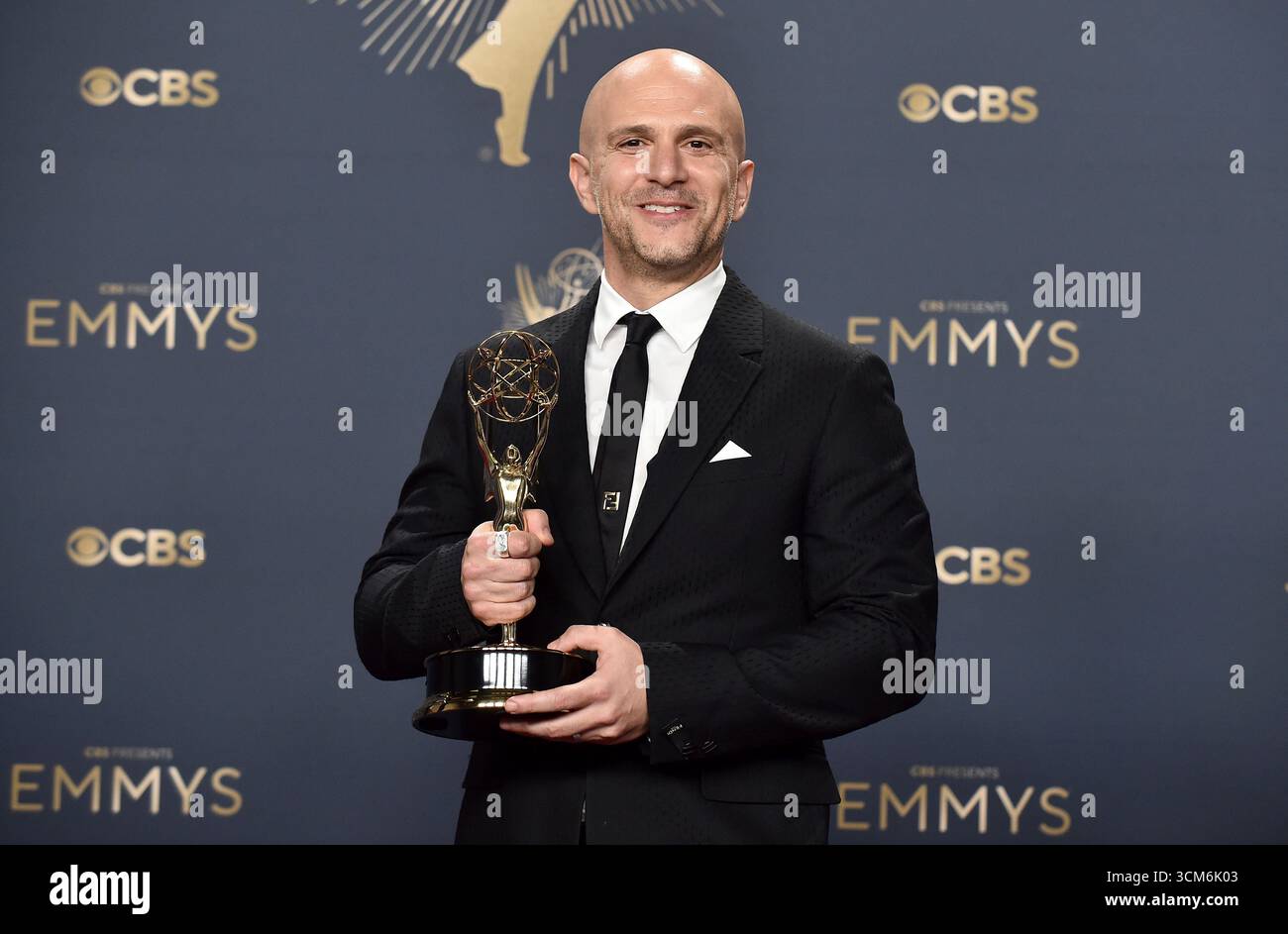 Adam Randall poses in the press room with the Emmy for Outstanding ...