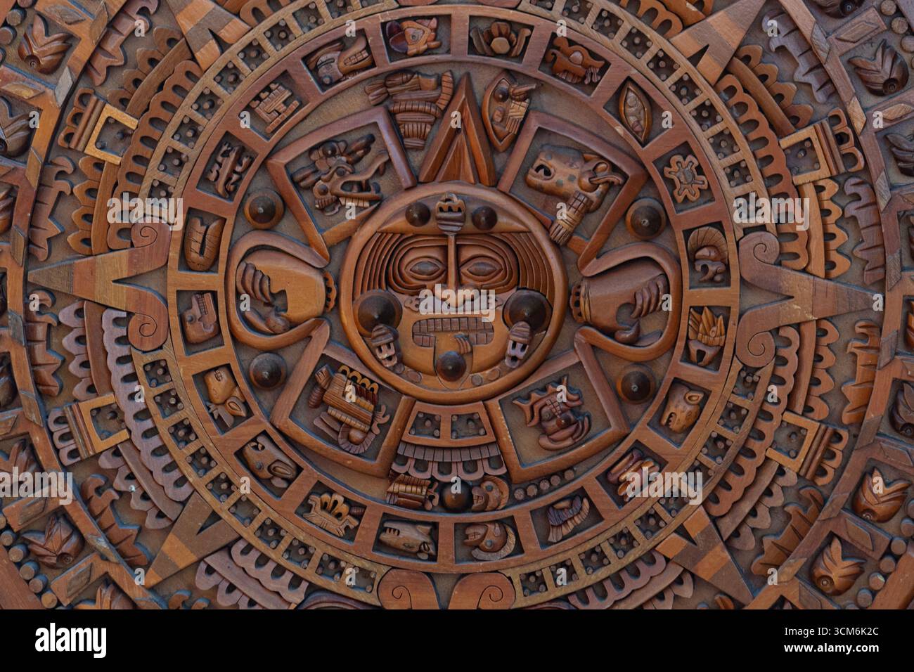 Close up to a wooden aztec calendar artcraf Stock Photo - Alamy