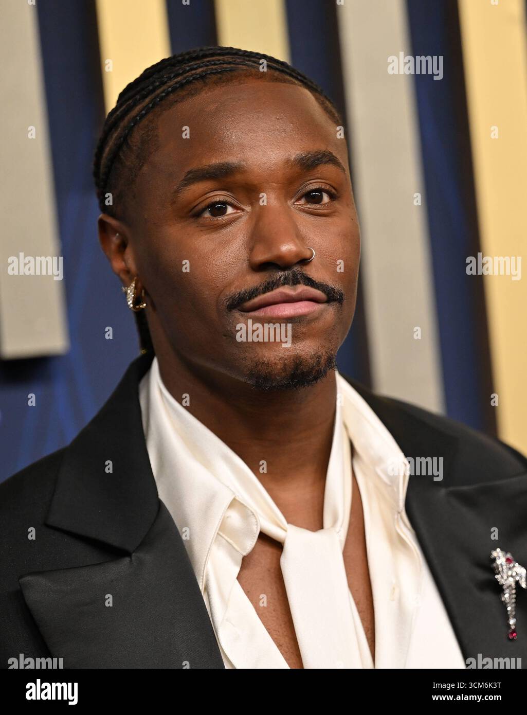 Dewayne Perkins arrives for the 77th annual Primetime Emmy Awards at ...