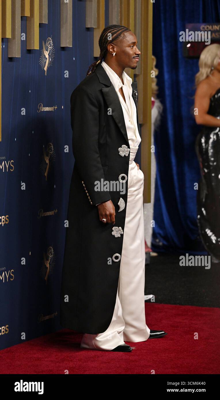 Dewayne Perkins arrives for the 77th annual Primetime Emmy Awards at ...