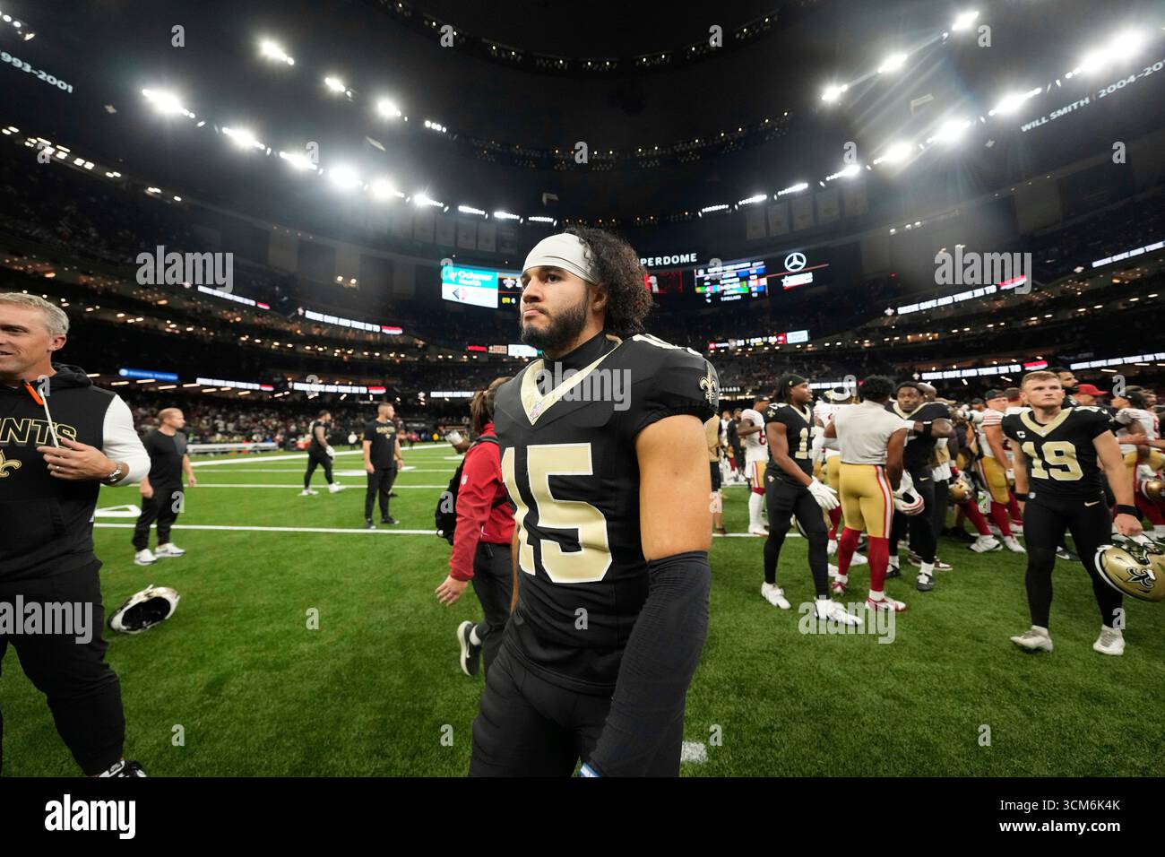 New Orleans Saints wide receiver Mason Tipton (15) walks off the field ...