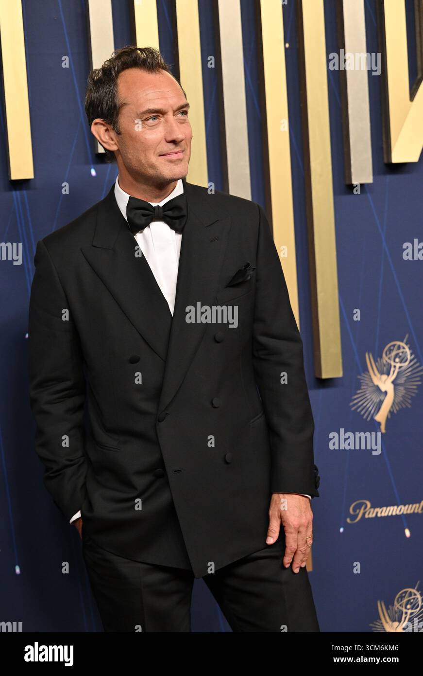 Jude Law arrives for the 77th annual Primetime Emmy Awards at the ...