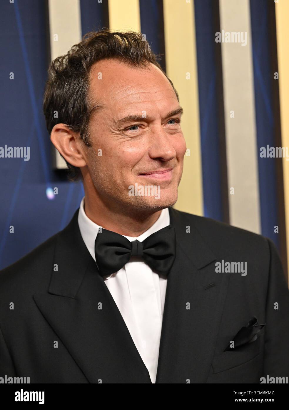 Jude Law arrives for the 77th annual Primetime Emmy Awards at the ...