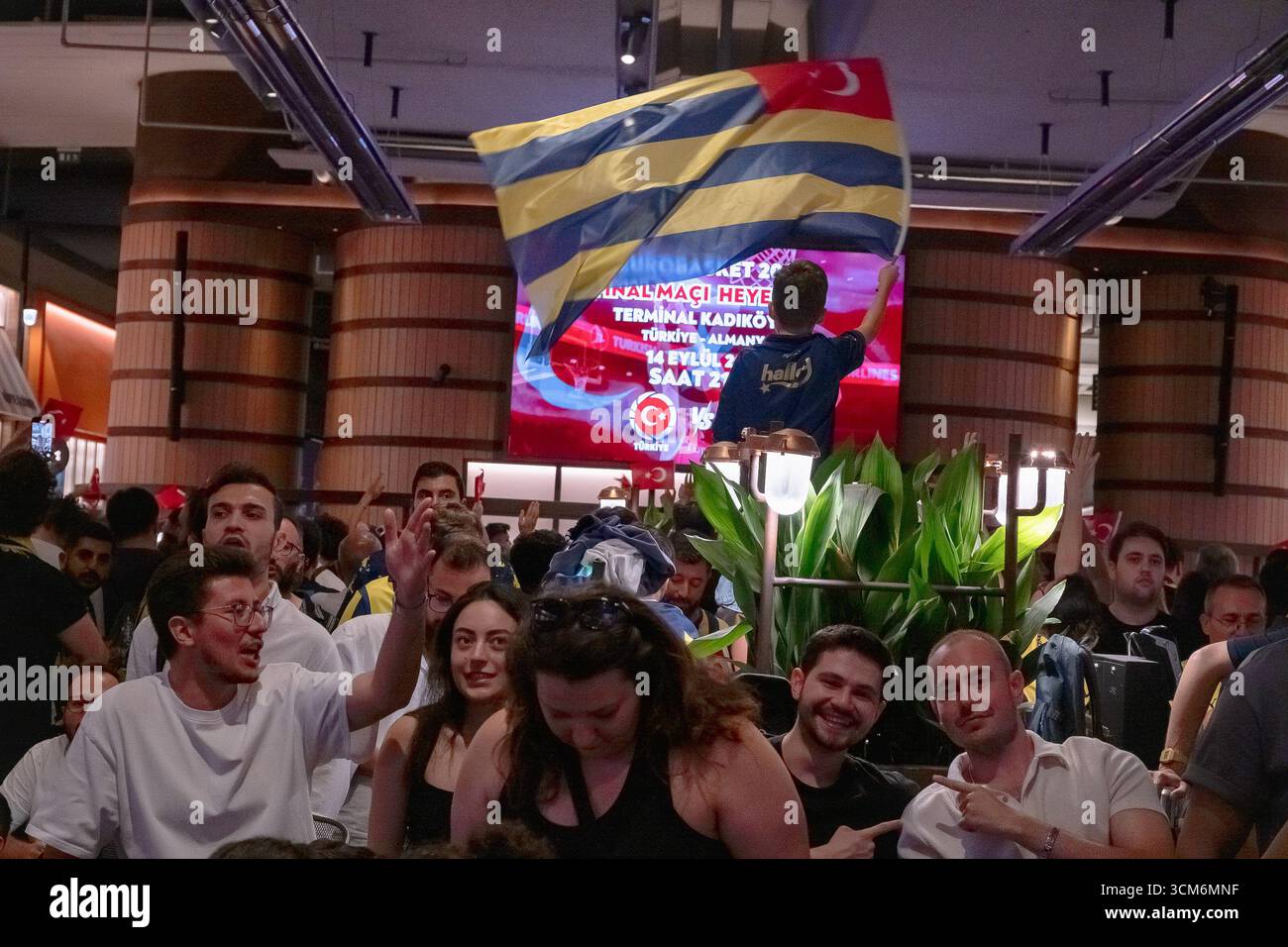 Turkish fans are seen following the match with great enthusiasm. The ...