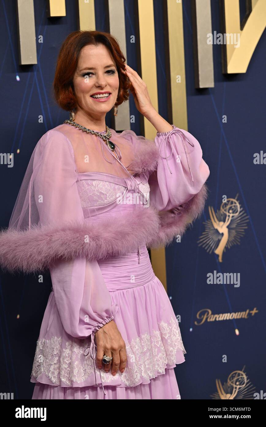 Parker Posey arrives for the 77th annual Primetime Emmy Awards at the ...