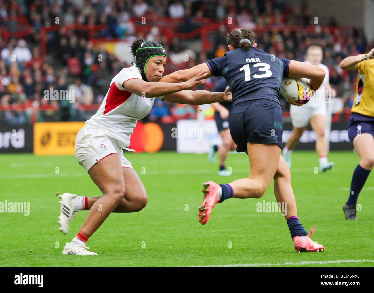 Bristol, UK. 14th August 2025. Sadia Kabeya (ENG) gets tackled by Emma ...