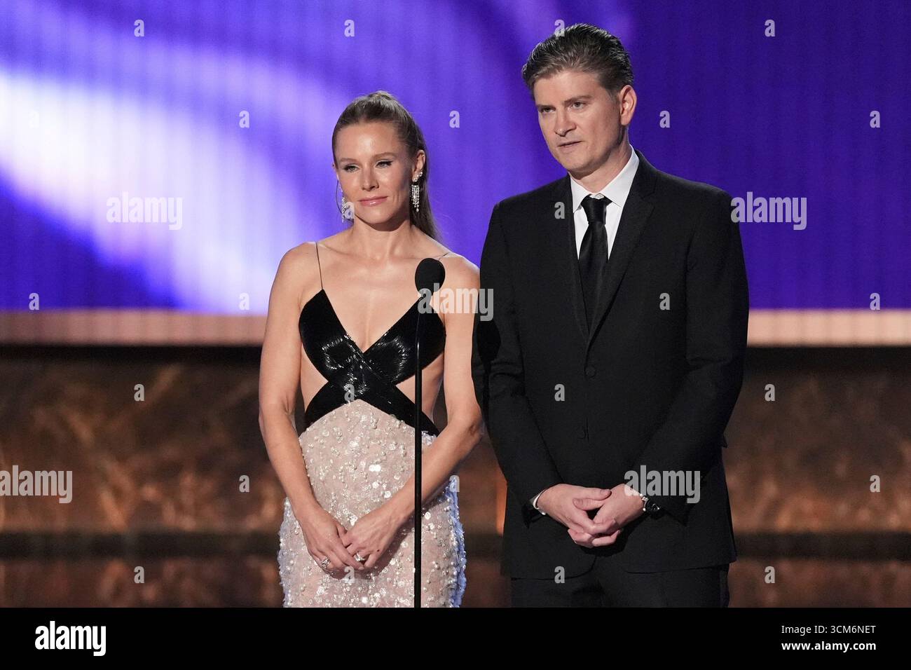 Kristen Bell, left, and Michael Schur present the Bob Hope humanitarian ...