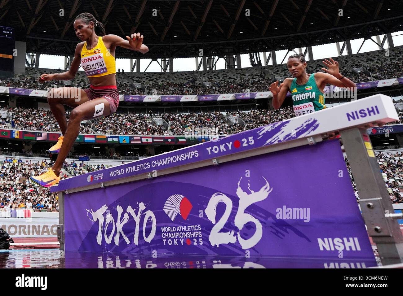 Uganda's Peruth Chemutai competes in her heat of the women's 3,000 ...