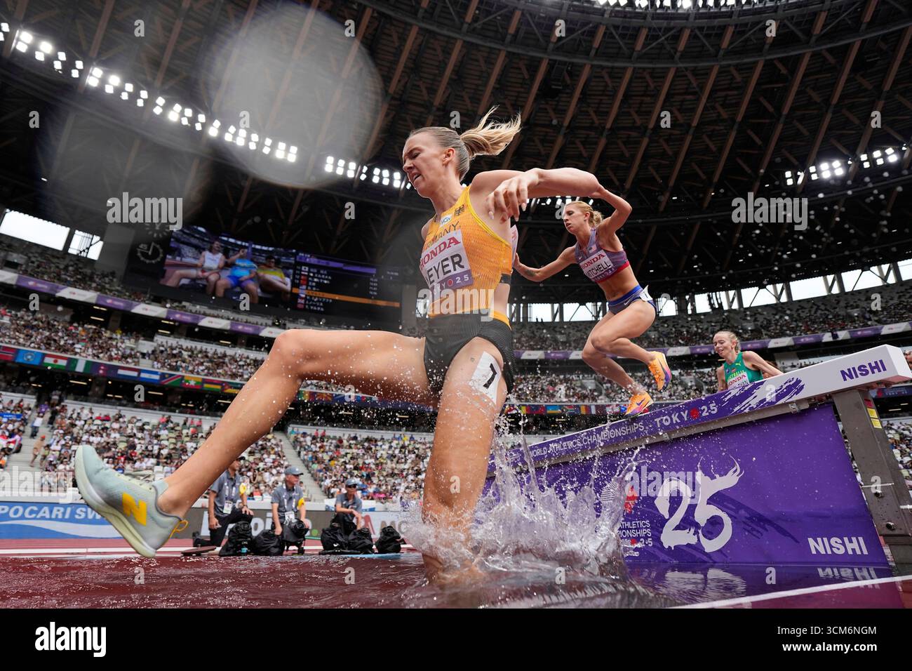Germany's Lea Meyer competes in a heat of the women's 3,000 meters ...